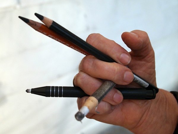 Hand with pens | The Working Artist Learning Site